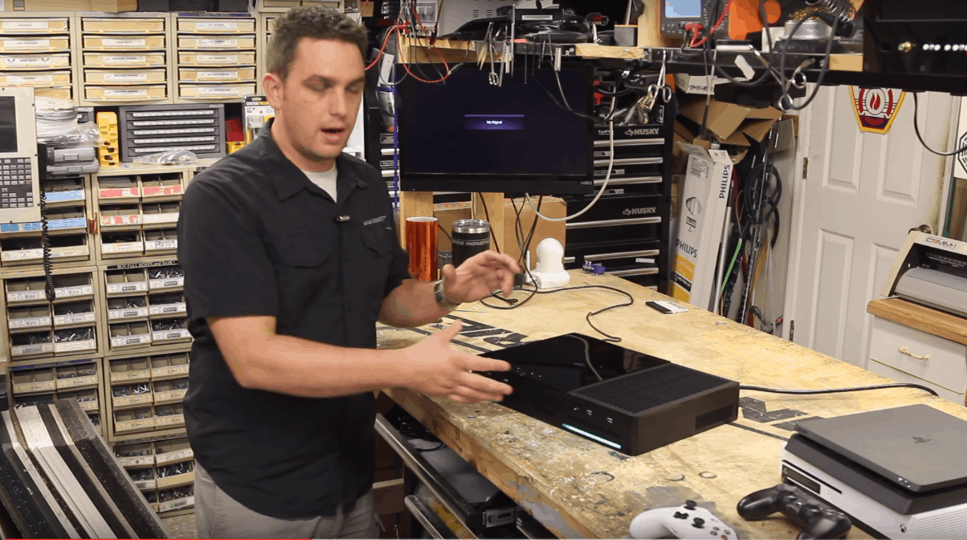 This guy jammed the Xbox One S and PS4 Slim together in one console ...