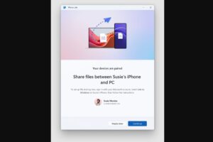 You can tranfer files in between an iPhone and a Windows PC now